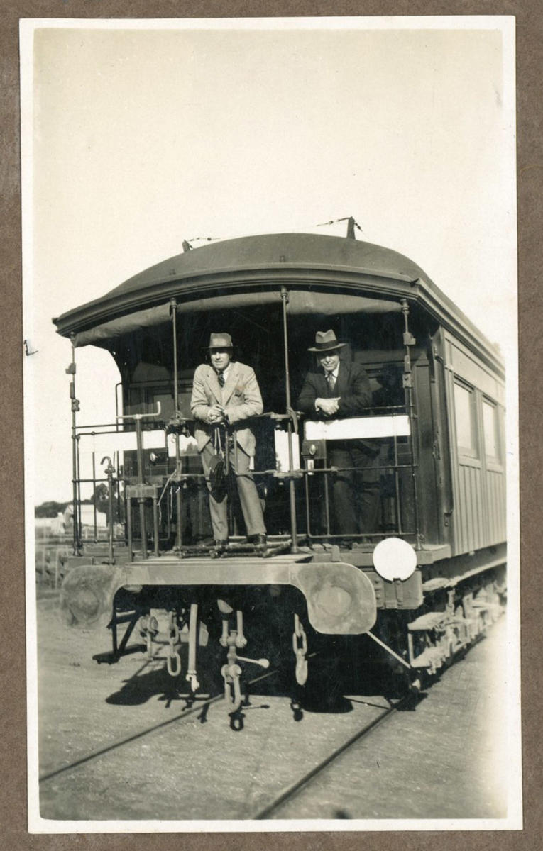 Photograph, Daryl Lindsay standing at the back of a train - National Trust